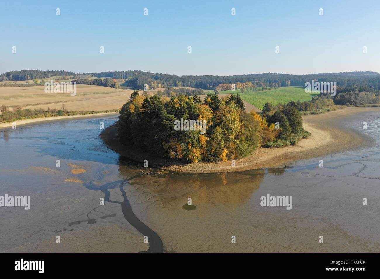 Aerial photo of dry drained breeding pond with mud. Carps, perch, roach ...