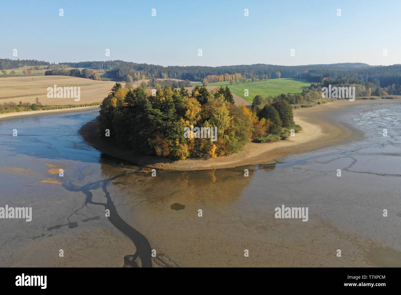 Aerial photo of dry drained breeding pond with mud. Carps, perch, roach ...