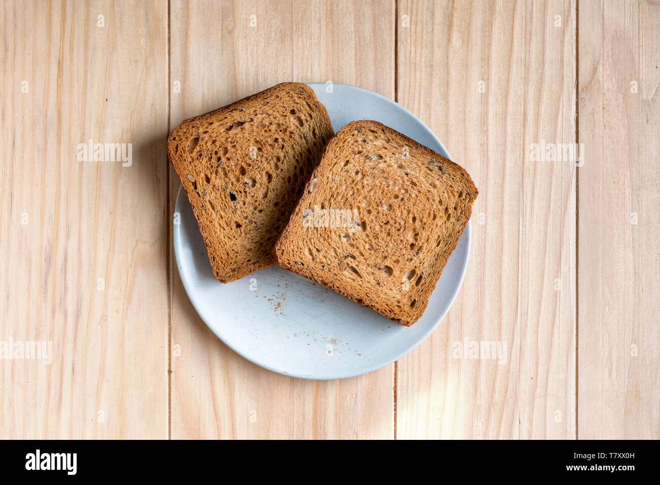 Two slices of whole wheat bread hi-res stock photography and images - Alamy