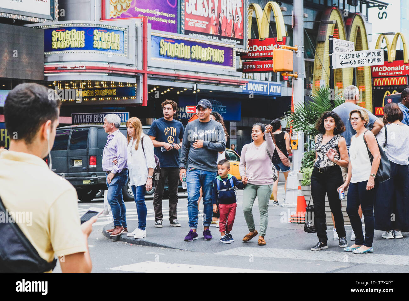 Faces on the streets of Times Square, NYC during the summer Stock Photo ...
