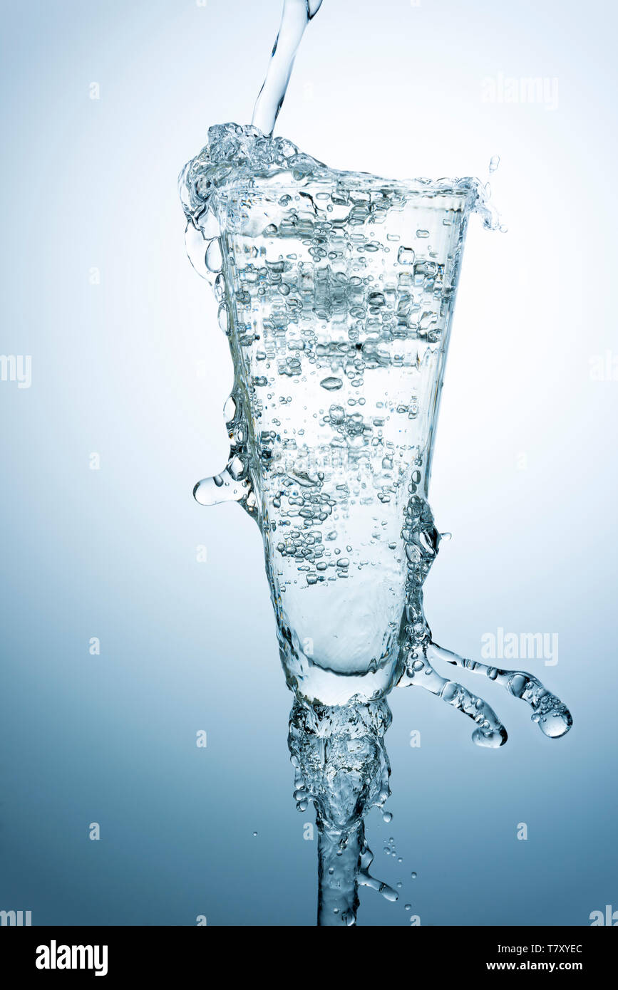 Overflowing glass fresh water hi-res stock photography and images - Alamy