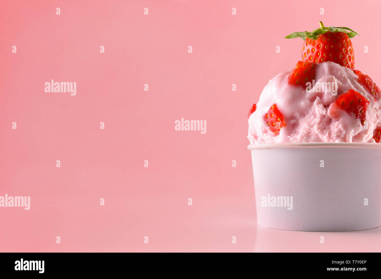 Strawberry ice cream cup on table isolated close up. Horizontal ...
