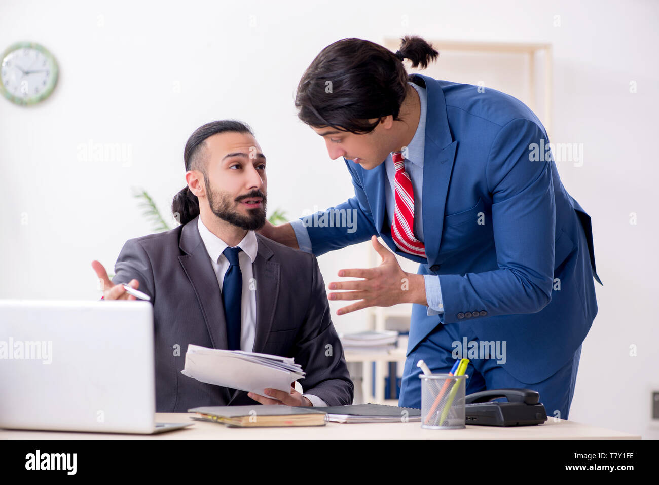 Two male colleagues in the office Stock Photo - Alamy