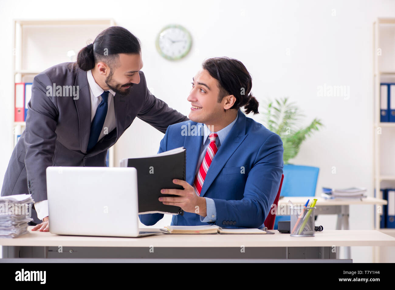 Two male colleagues in the office Stock Photo - Alamy