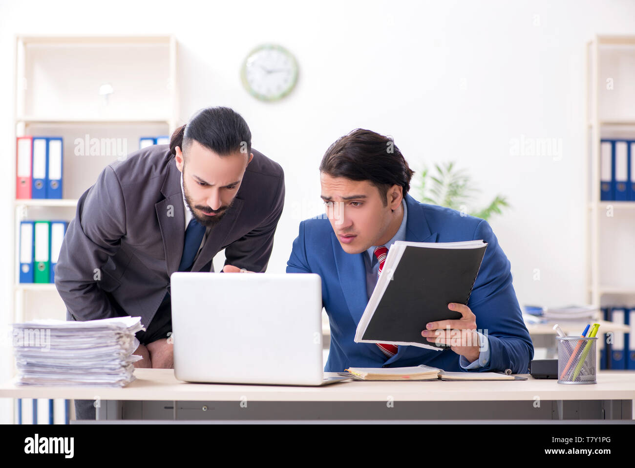 Two male colleagues in the office Stock Photo - Alamy