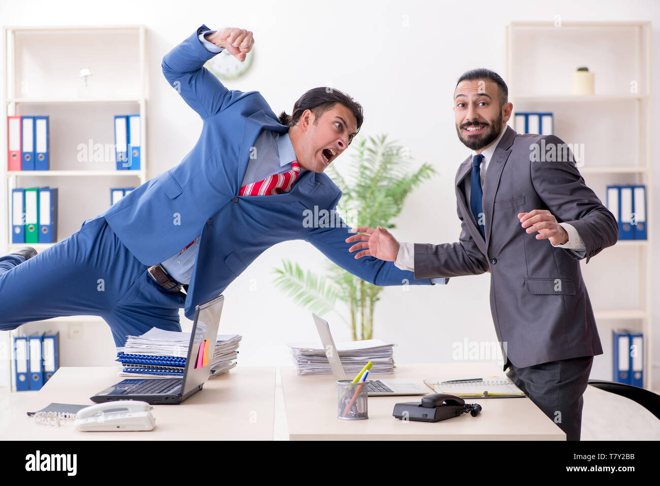 Two male colleagues in the office Stock Photo - Alamy