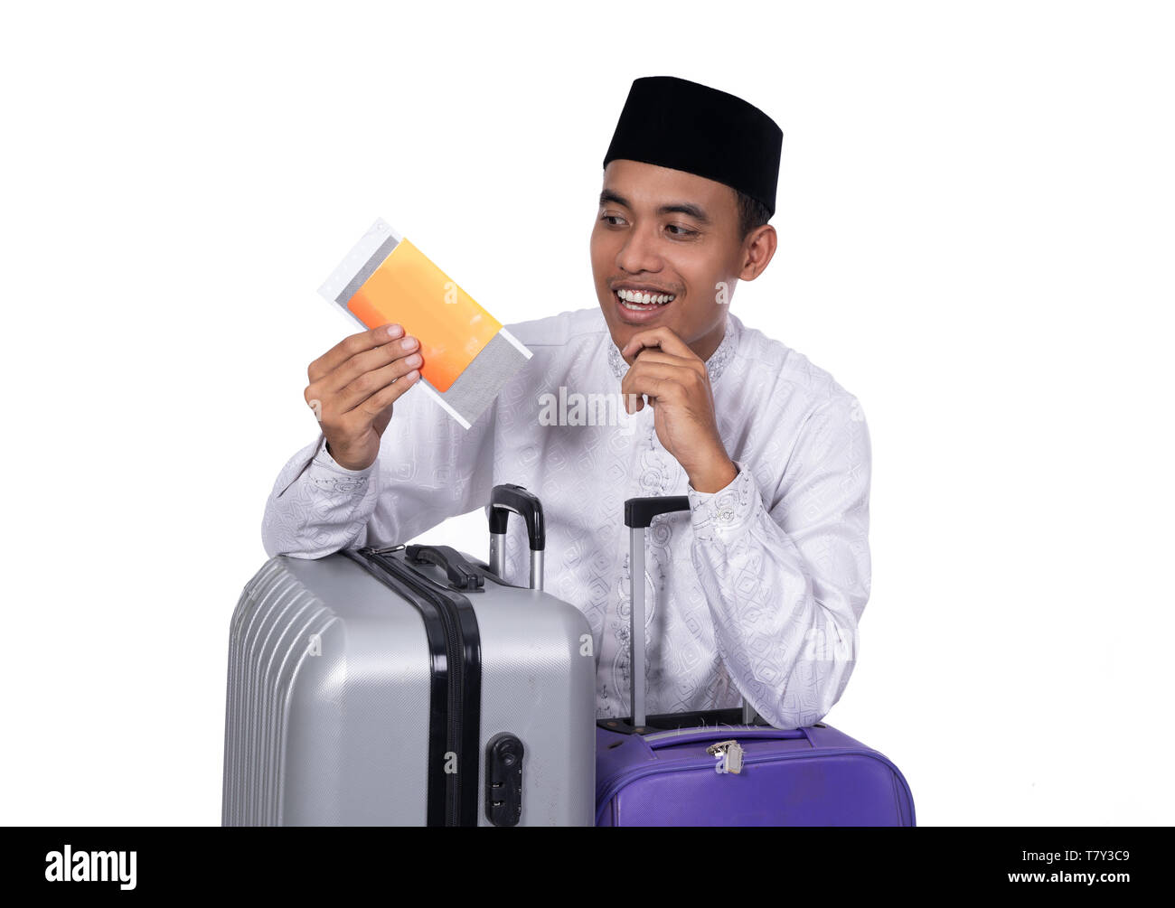 man muslim with passport and boarding pass and suitcase Stock Photo - Alamy