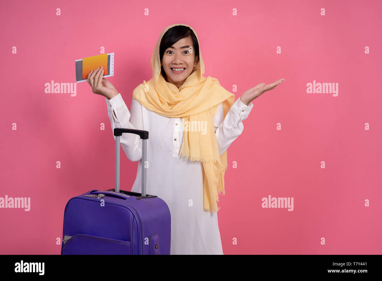 excited muslim woman with head scarf smiling Stock Photo - Alamy