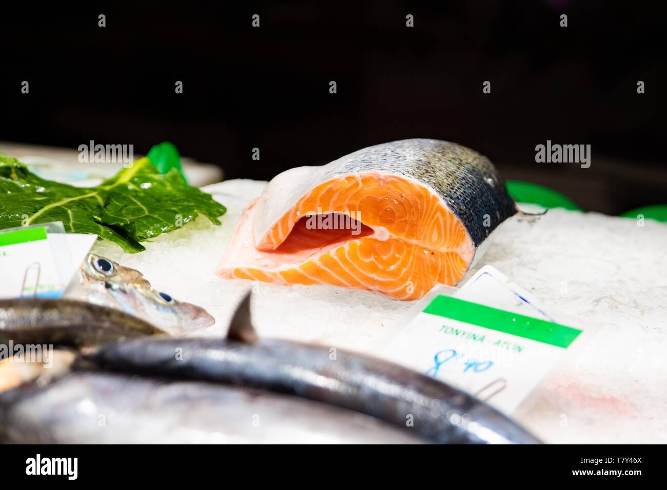 Raw fresh seafood tuna fish on display in fish market Stock Photo - Alamy