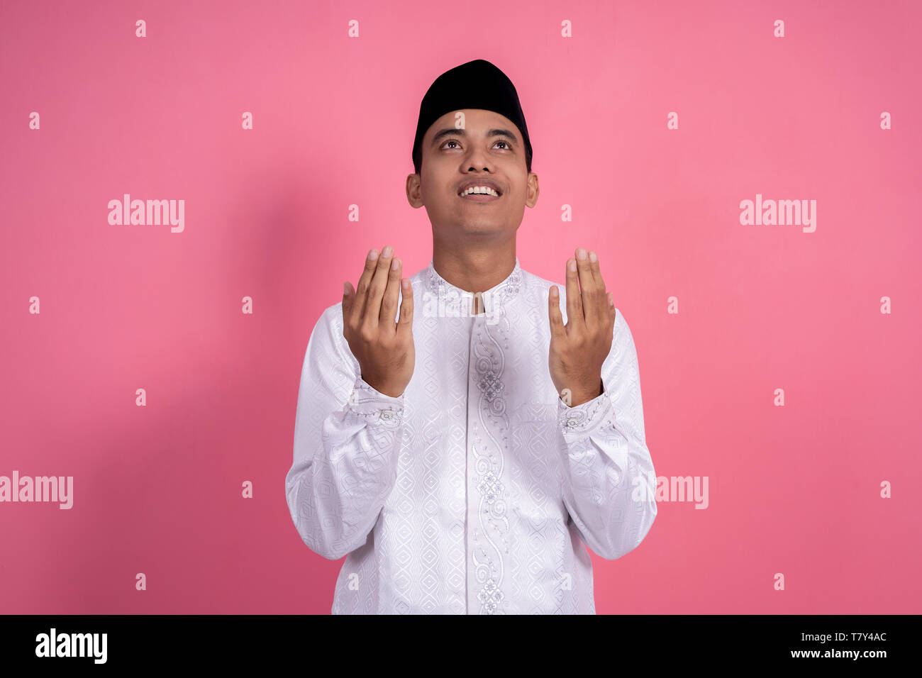 muslim man open arm pray gesture Stock Photo - Alamy