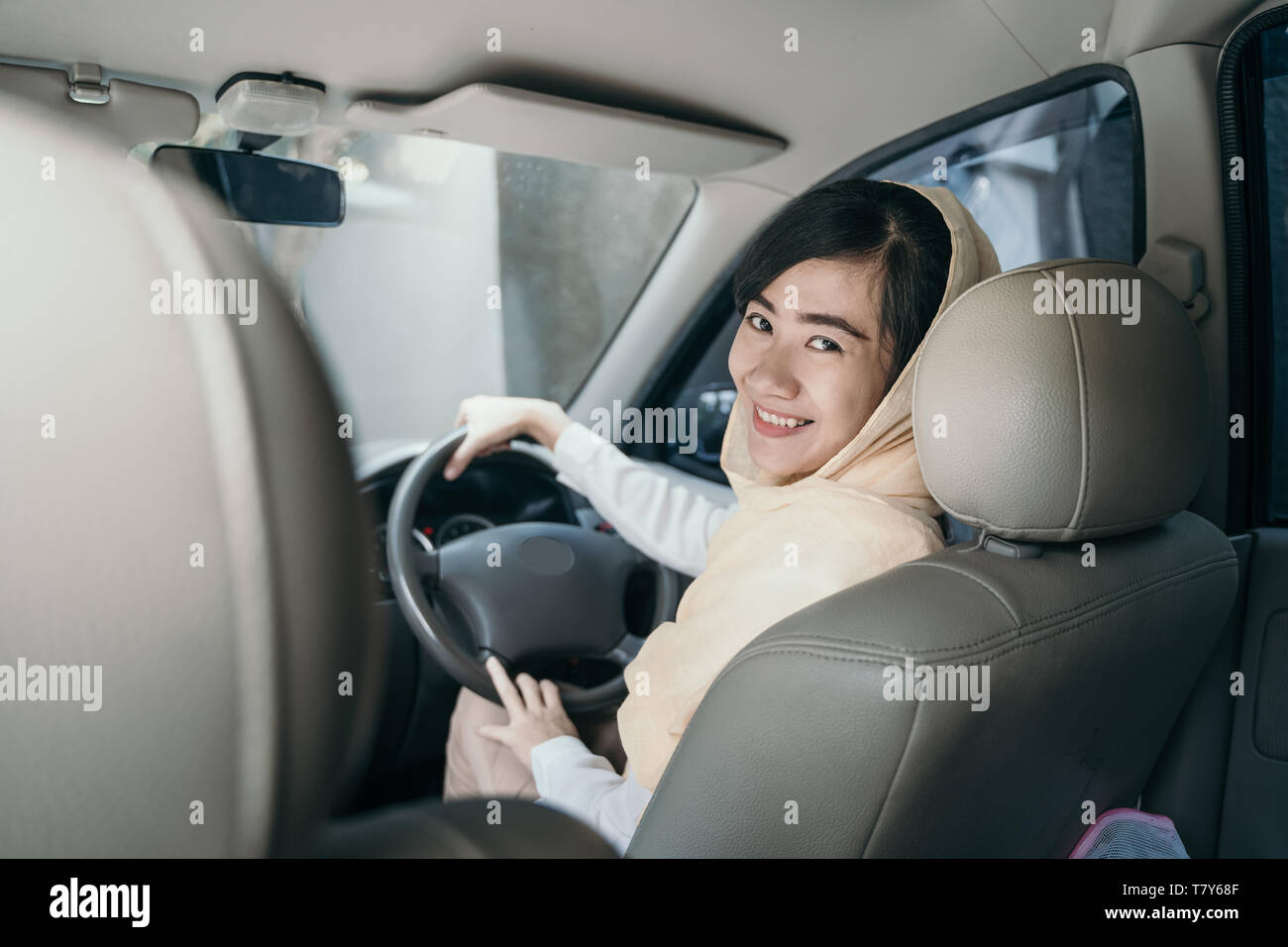muslim woman drive car Stock Photo - Alamy