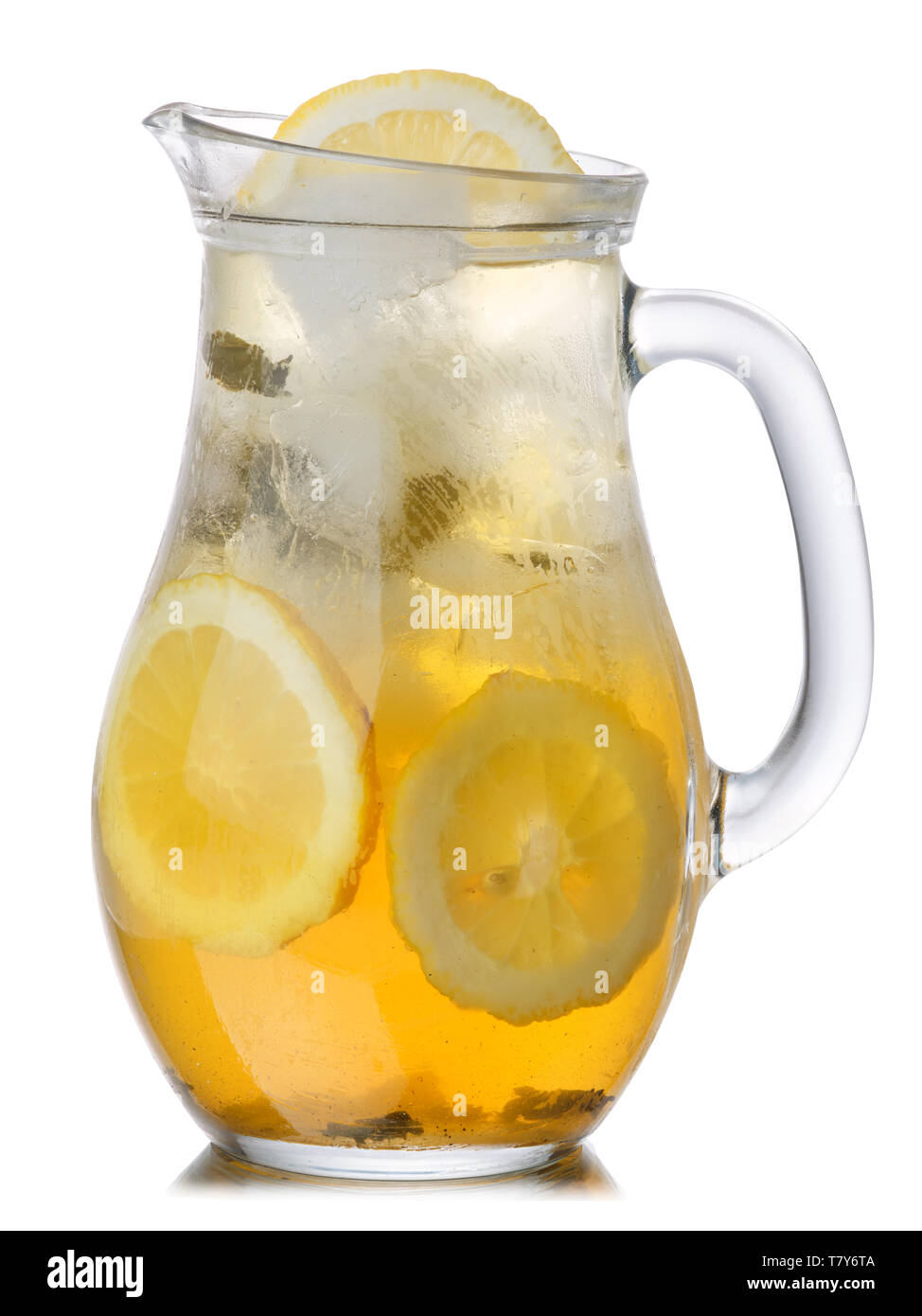 Glass jug of green iced tea with lemon, isolated Stock Photo - Alamy