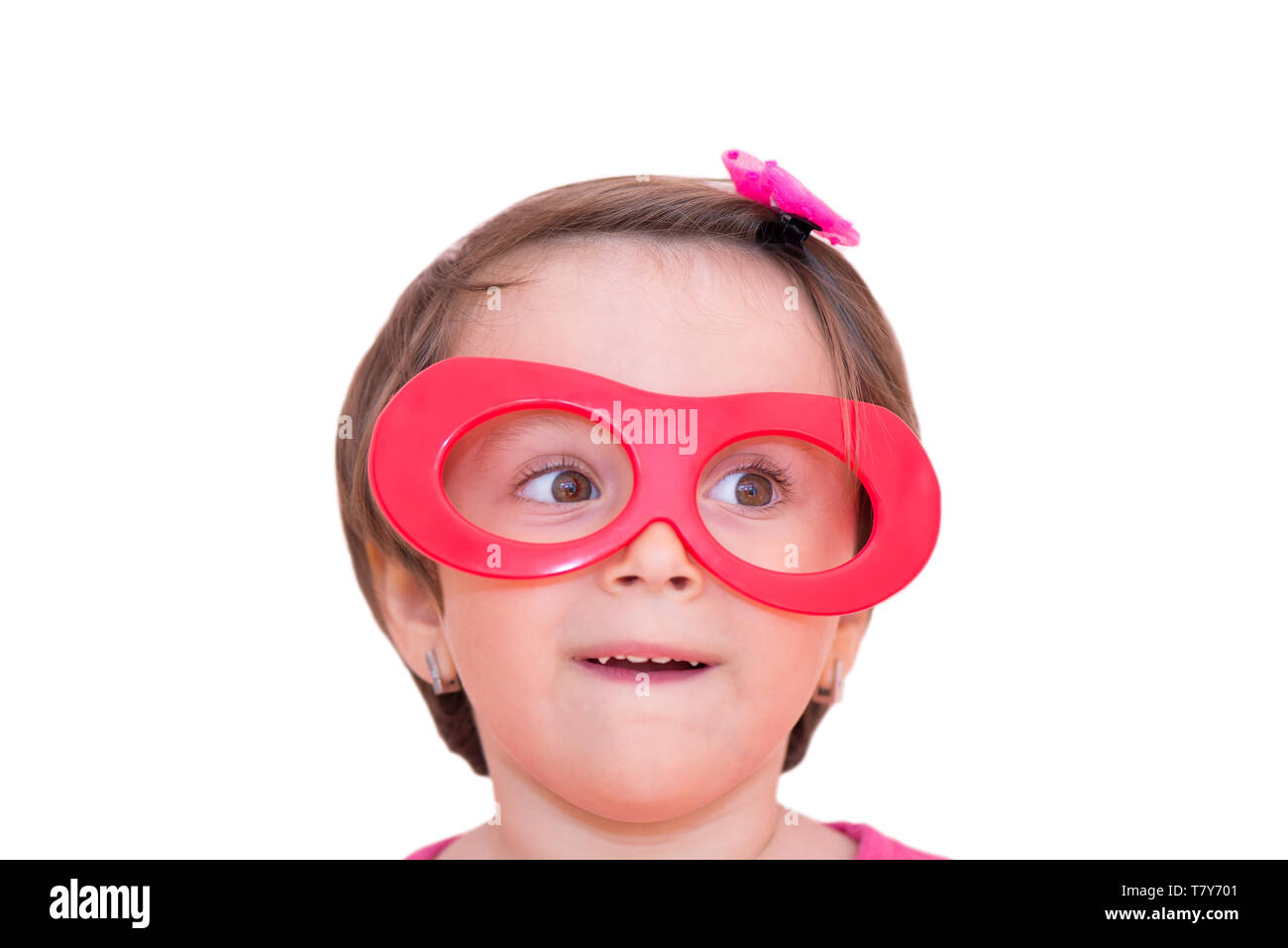 Portrait of a little girl wearing red plastic toy eyeglasses Stock ...