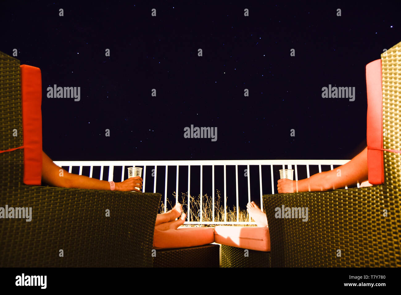 Couple stars watching hi-res stock photography and images - Alamy