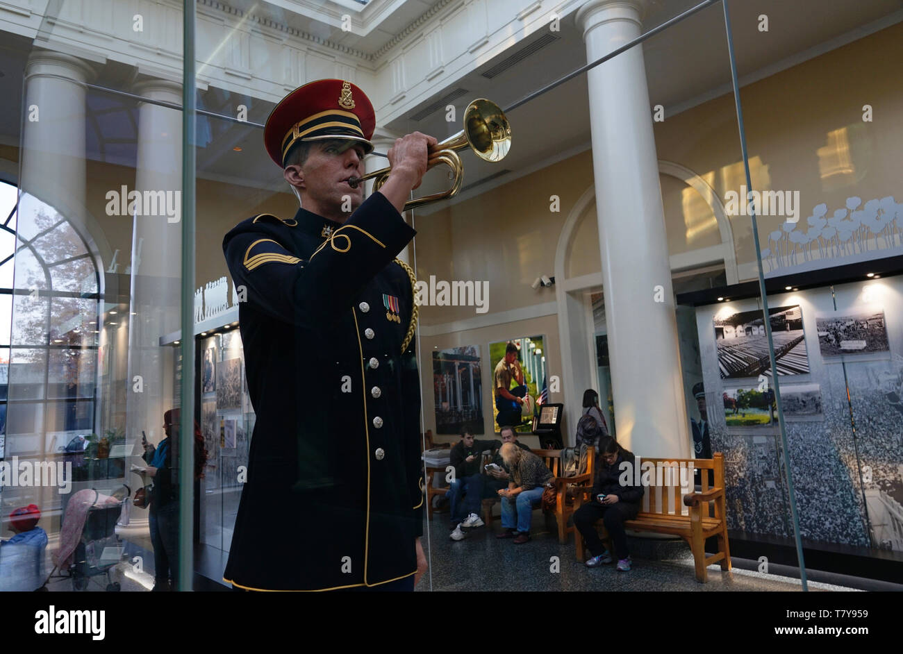 A life-size replica of U.S. Army Bugler Staff Sgt. Jesse Tubb in ...