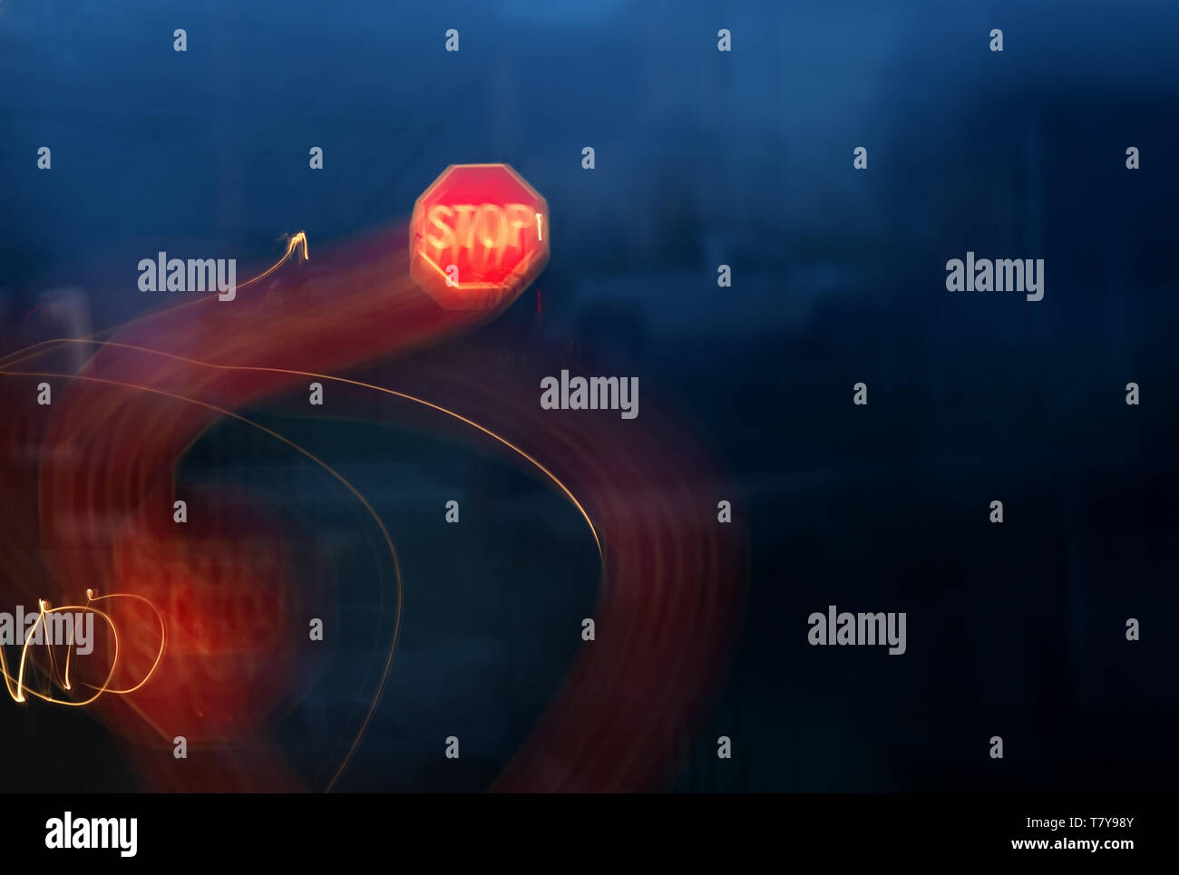 Distorted stop sign at road intersection as seen from drunk, drugged ...