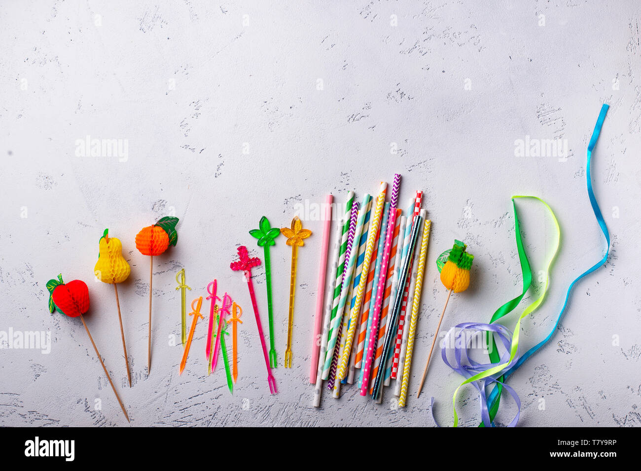Items for summer party. Paper straws and toppers Stock Photo - Alamy