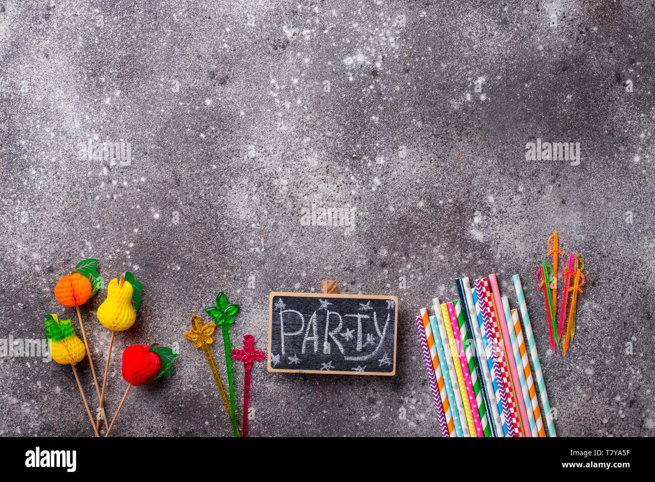 Items for summer party. Paper straws and toppers Stock Photo - Alamy