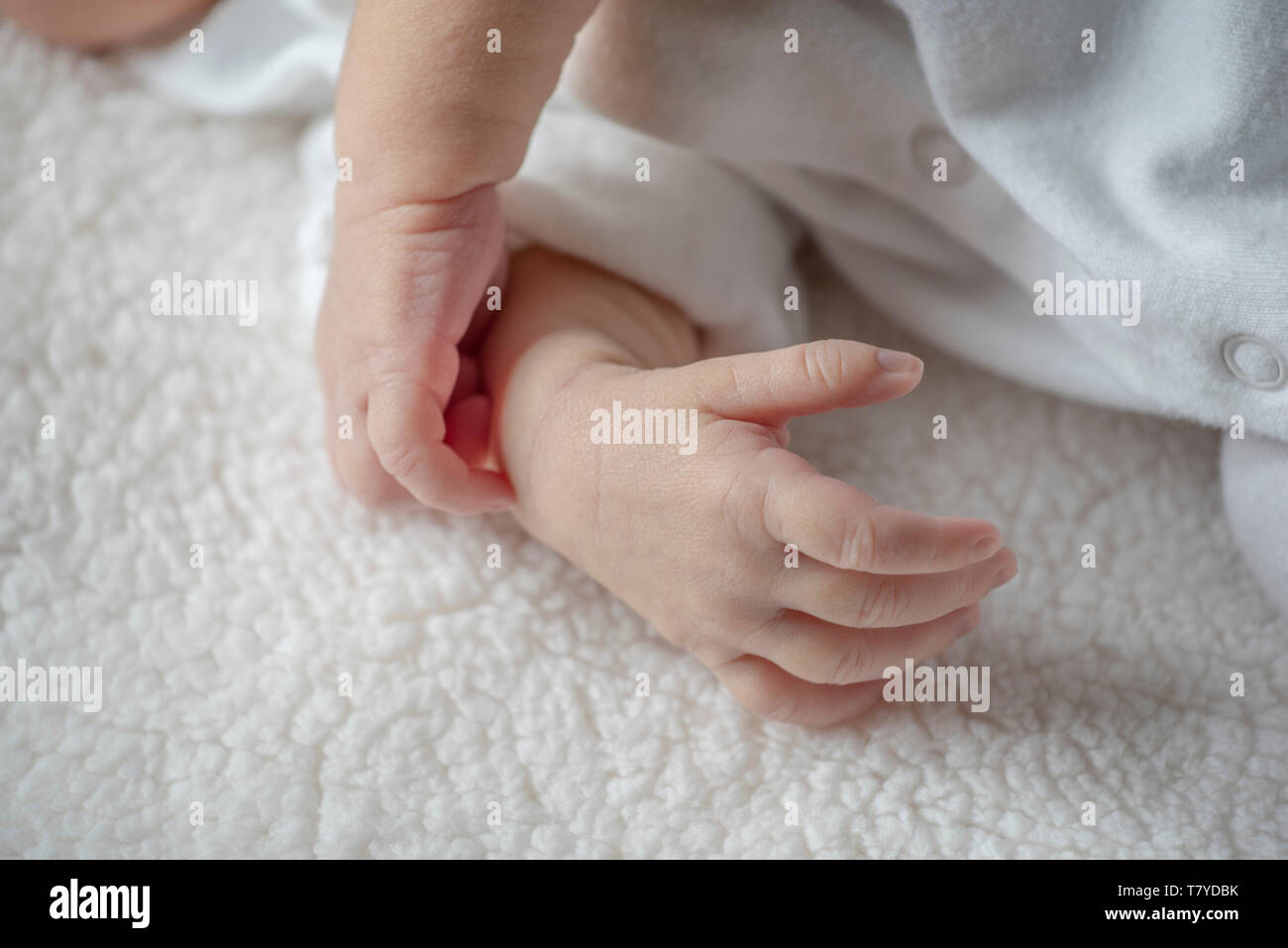 little hand of sleeping baby newborn Stock Photo - Alamy