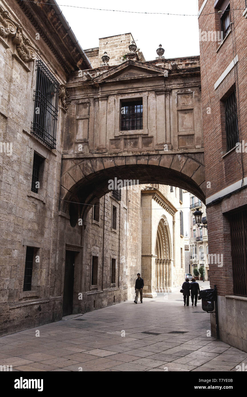 Spain, Valencia, Archway in Calle de la Barchilla and facade of ...