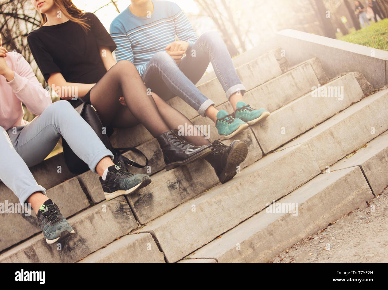 Crop photo of group of friends Millennials students teenagers sitting ...