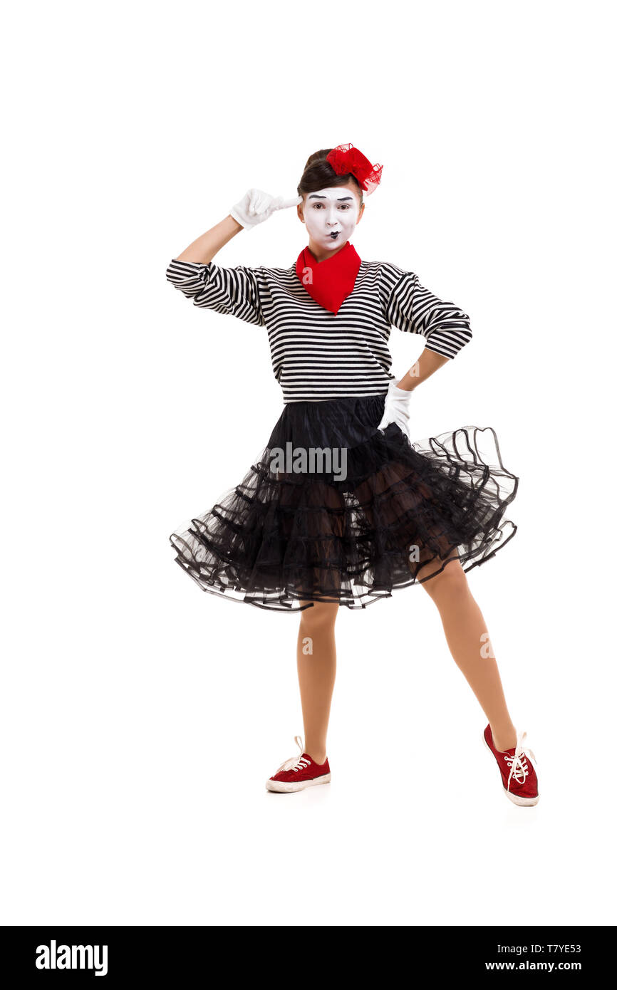 Full length portrait of a mime woman artist looking at camera and ...