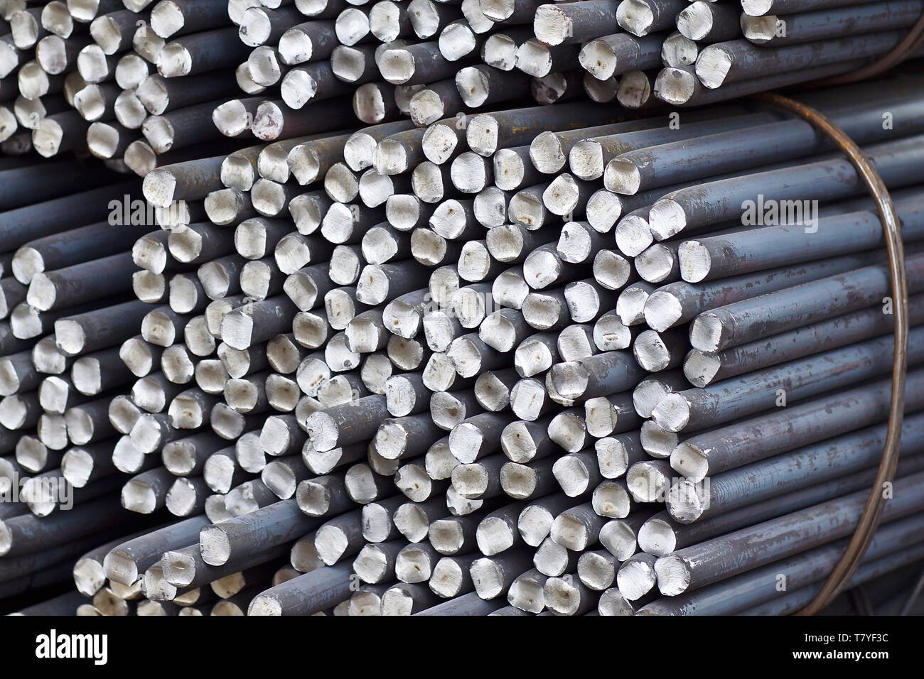Metal profile of round section in packs at the warehouse of metal ...