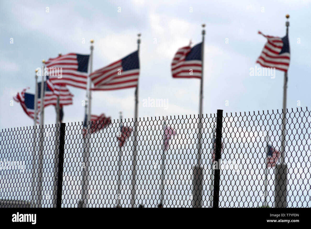 Flag behind metal fence hi-res stock photography and images - Alamy