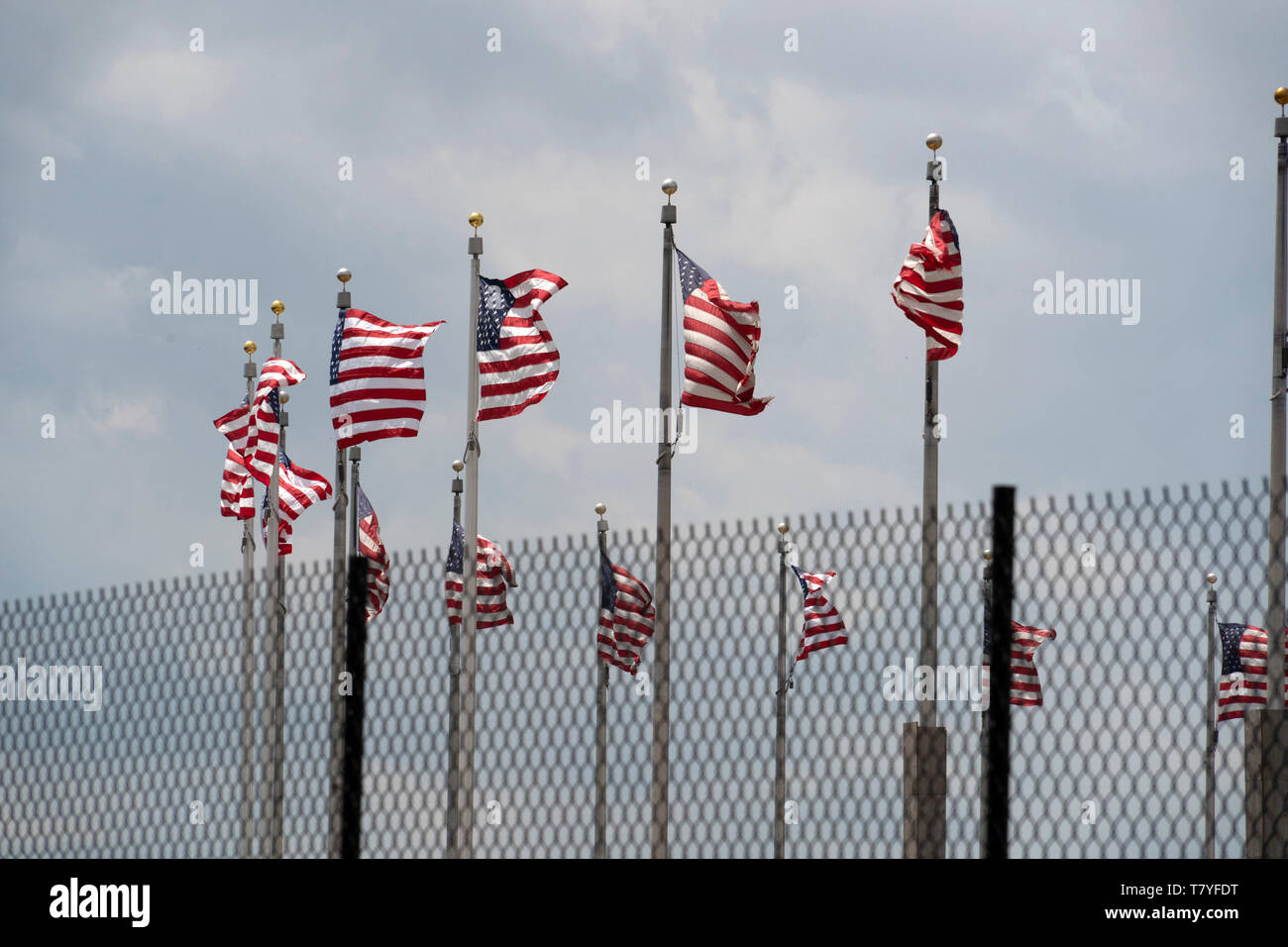 Flag behind metal fence hi-res stock photography and images - Alamy