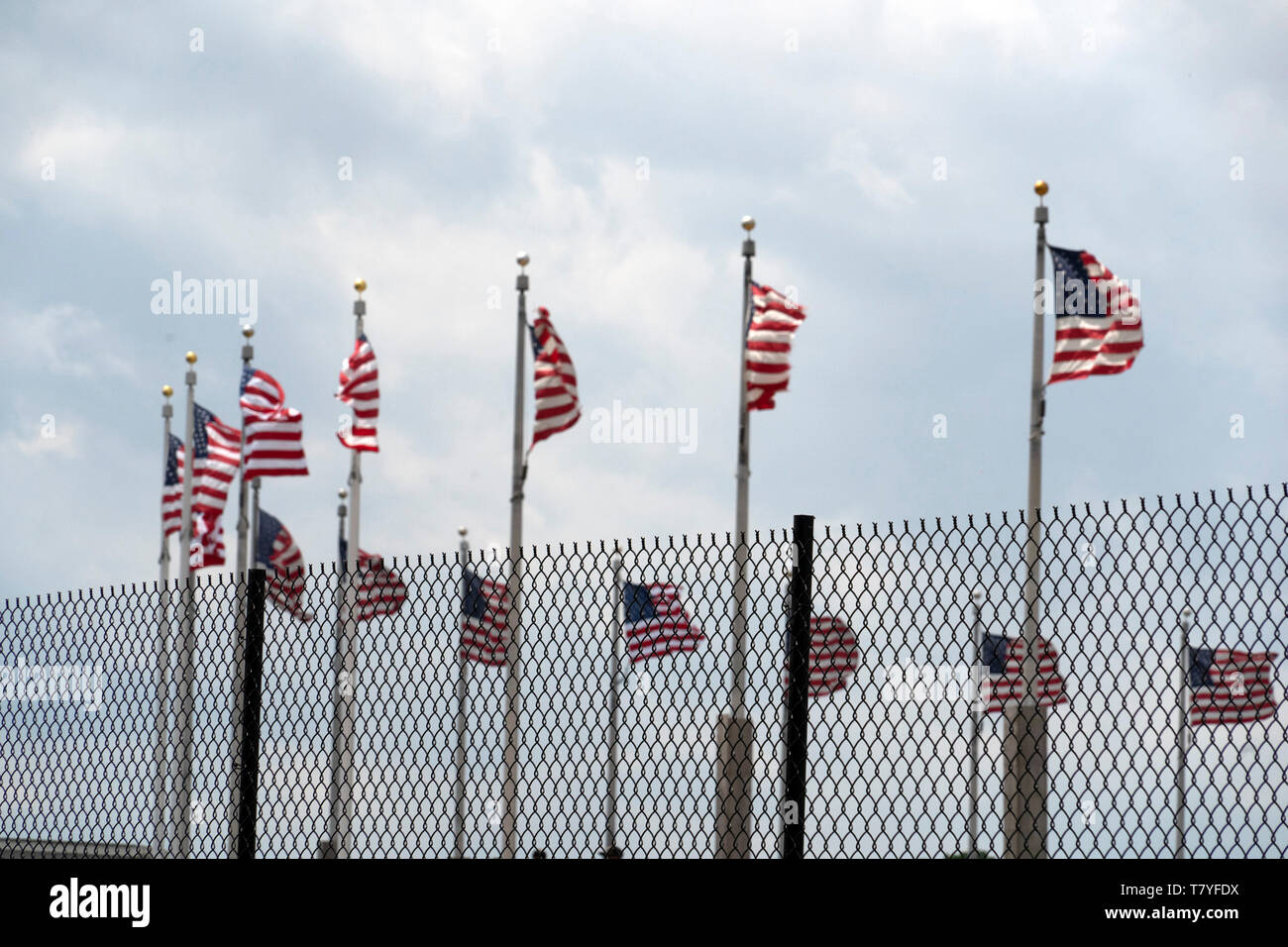 Flag behind metal fence hi-res stock photography and images - Alamy