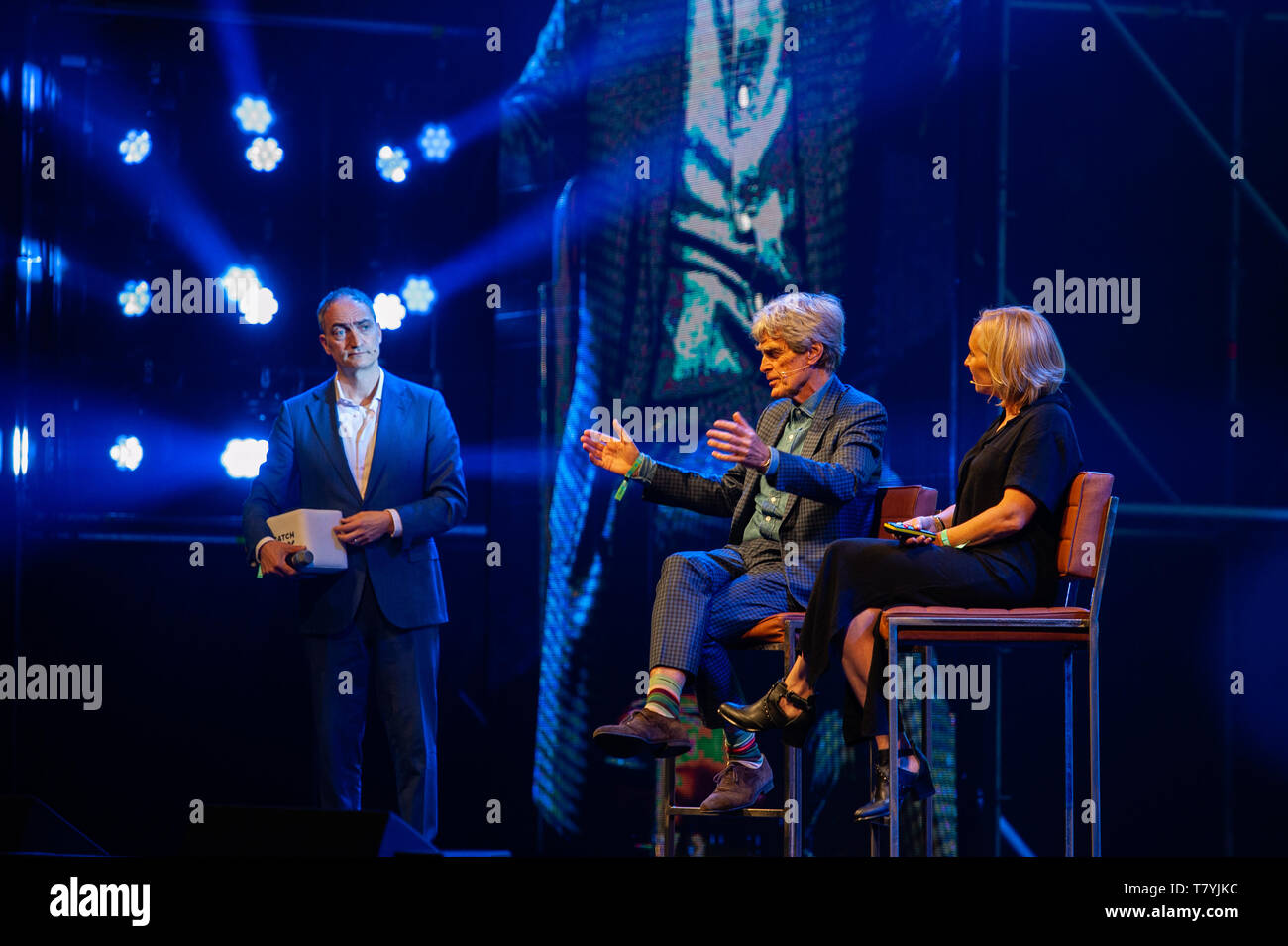 Emma Harman and Sir John Hegarty are seen during the conference. The ...