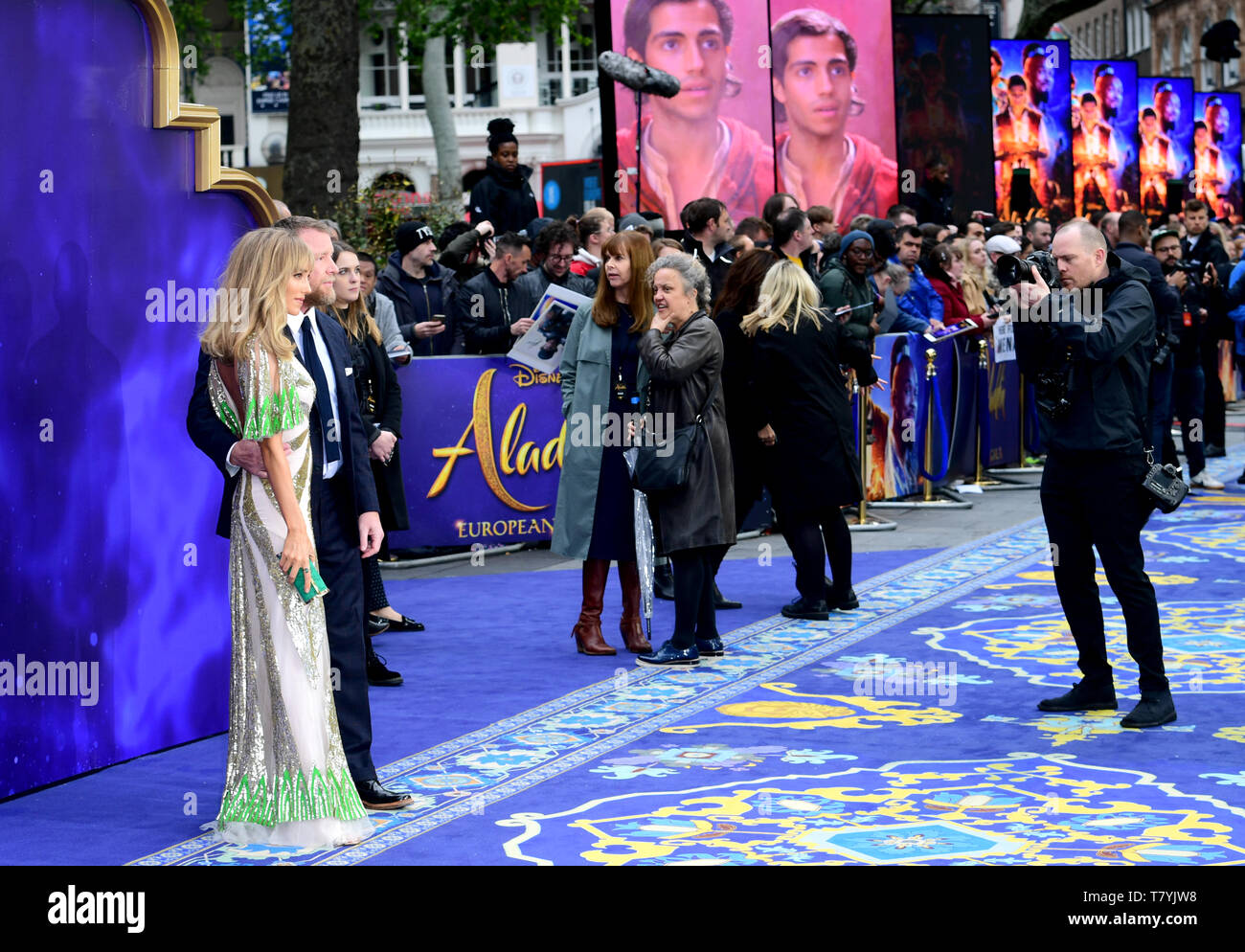 Guy Ritchie and Jacqui Ritchie (left) pose for a photographer whilst ...