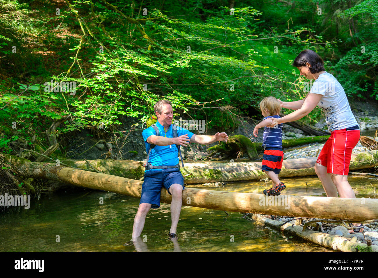 Boy walk in river hi-res stock photography and images - Alamy