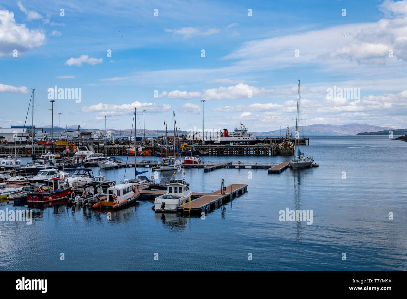 Fishing boats and lifeboat in mallaig harbour hi-res stock photography ...