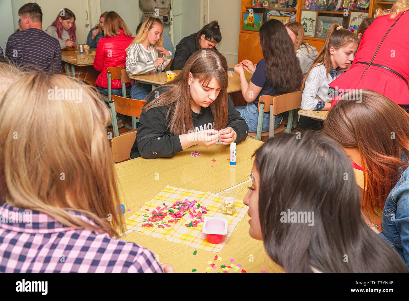 Students create crafts from paper Stock Photo - Alamy
