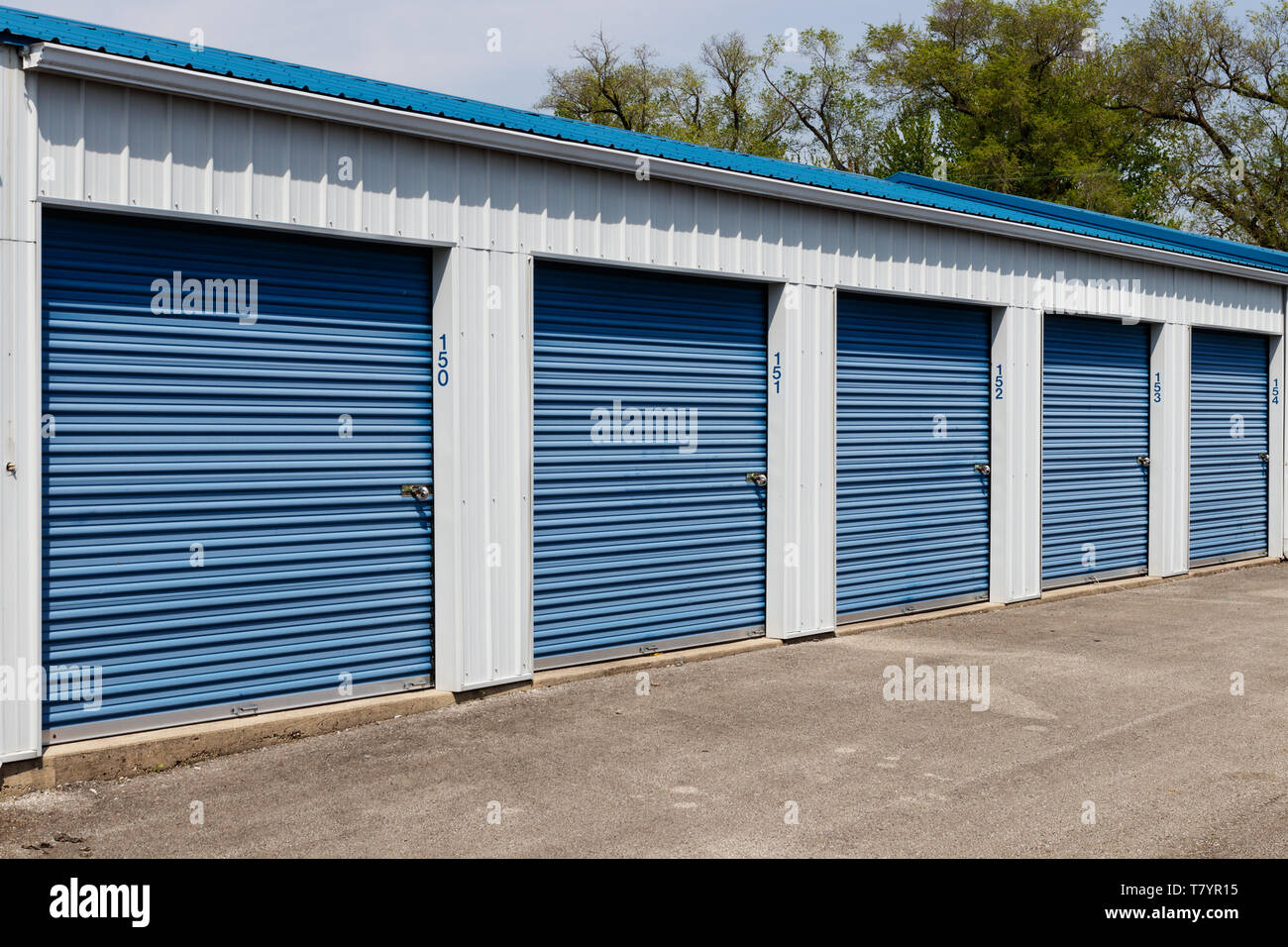 Numbered self storage and mini storage garage units Stock Photo - Alamy
