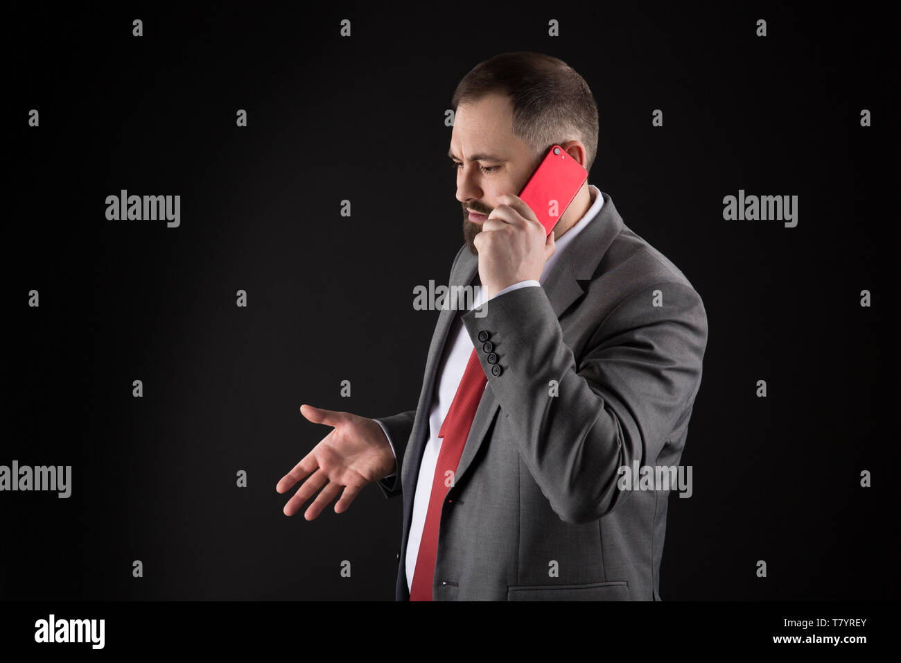 Guy call friend stand black background. Mobile call concept. Man ...