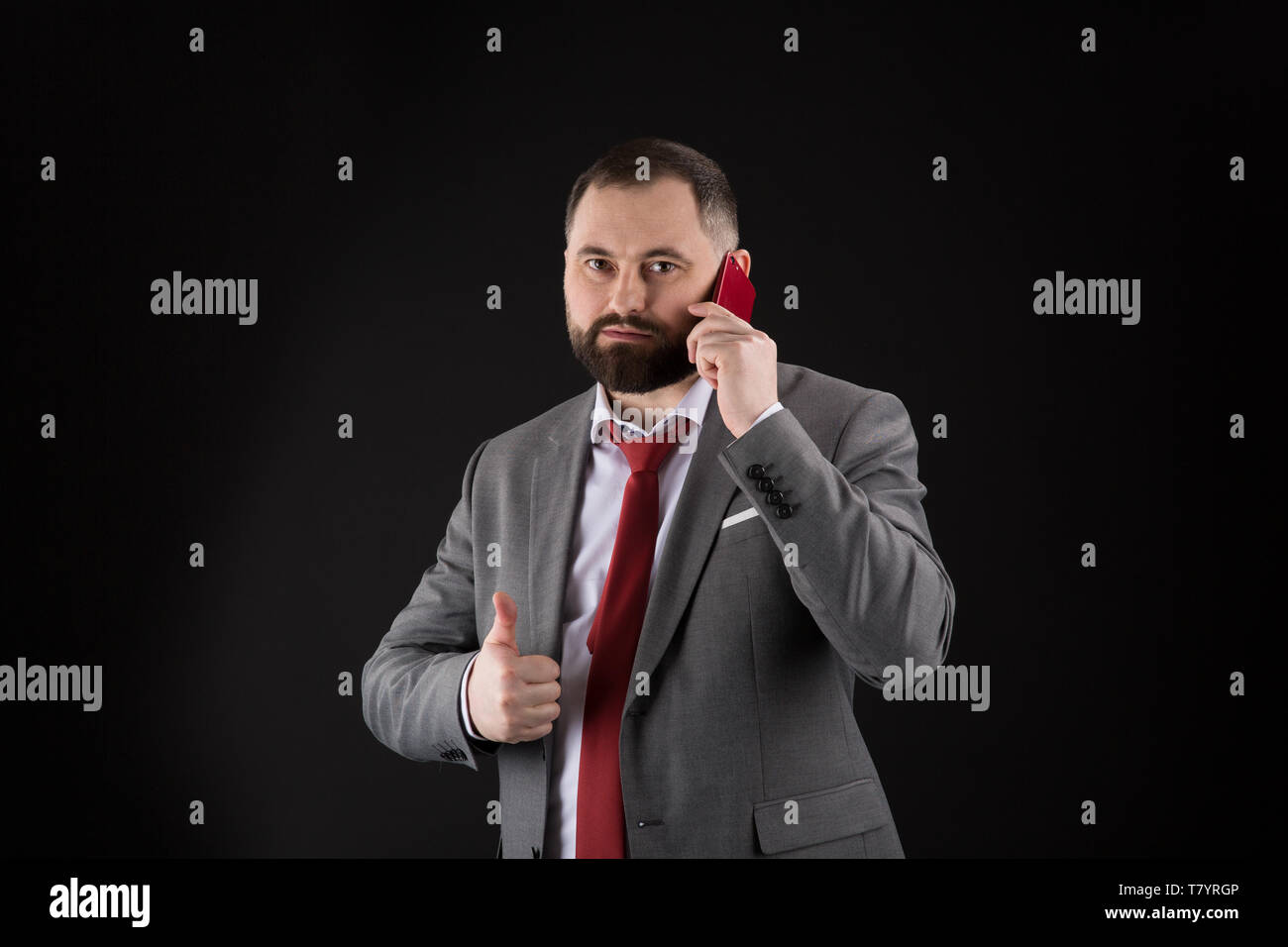 Guy call friend stand black background. Mobile call concept. Man ...