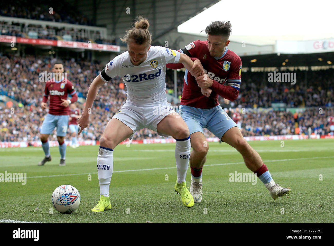 Leeds United's Luke Ayling (left) and Aston Villa's Jack Grealish ...