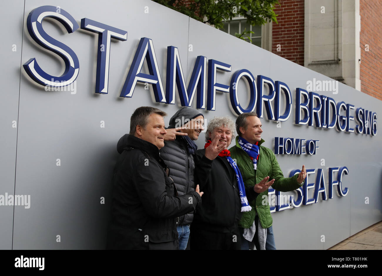 Fans pose by a Stamford Bridge sign before the UEFA Europa League, Semi ...