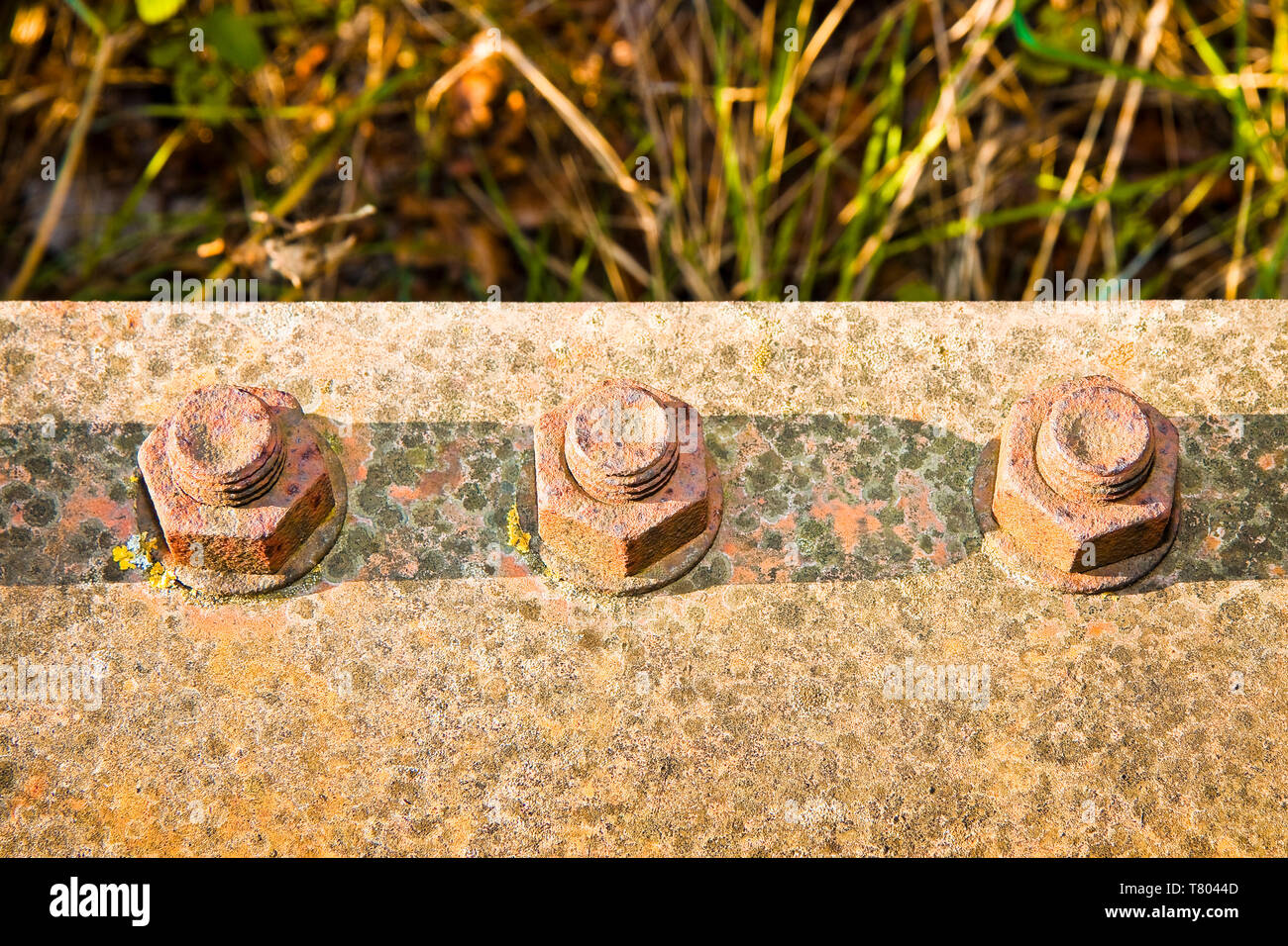 Old rusty anchor bolt with iron plate Stock Photo - Alamy