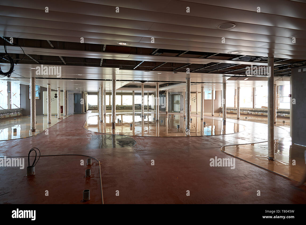 Labour shipping construction workers at the yard working on a new ship ...