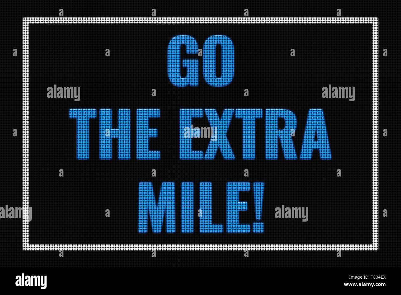 Go The Extra Mile text on dark screen, tv effect Stock Photo - Alamy