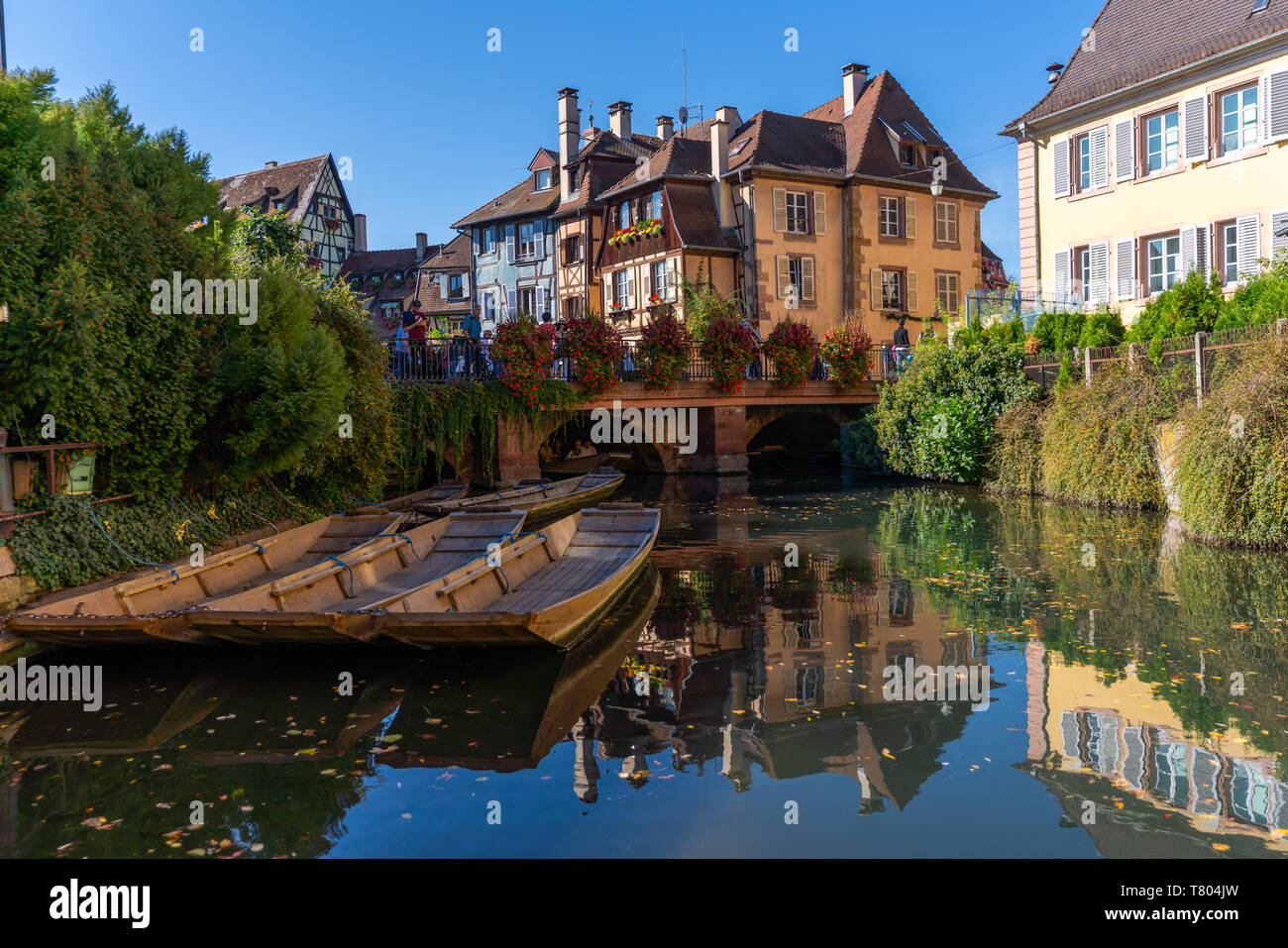boats on the canal in colmar france with flower bridge Stock Photo - Alamy