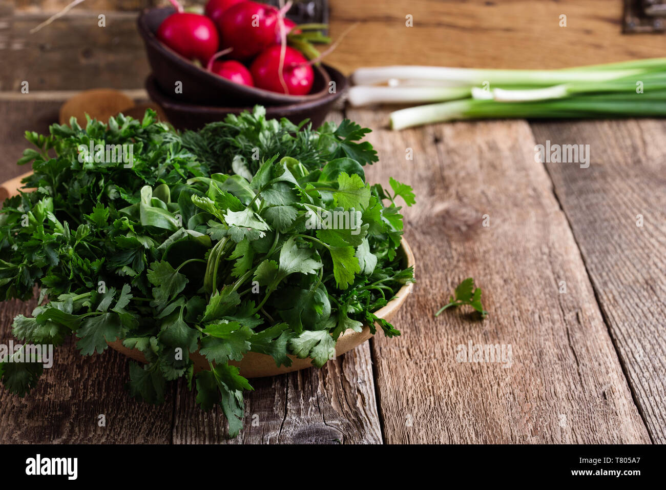 Plant fresh green vegetables and herbs cooking ingredient on rural ...