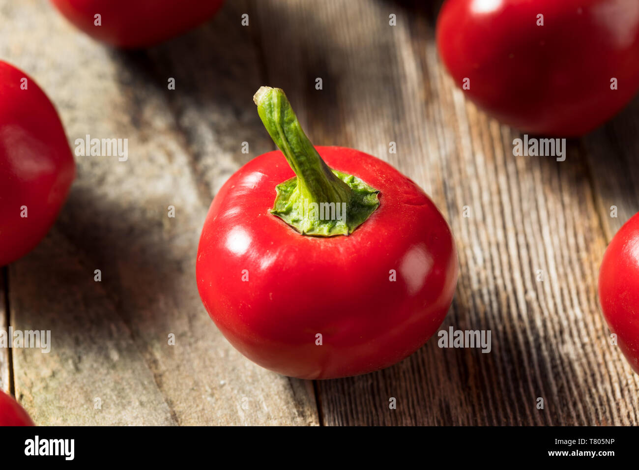 Raw Organic Red Cherry Bomb Peppers Ready to Cook Stock Photo - Alamy