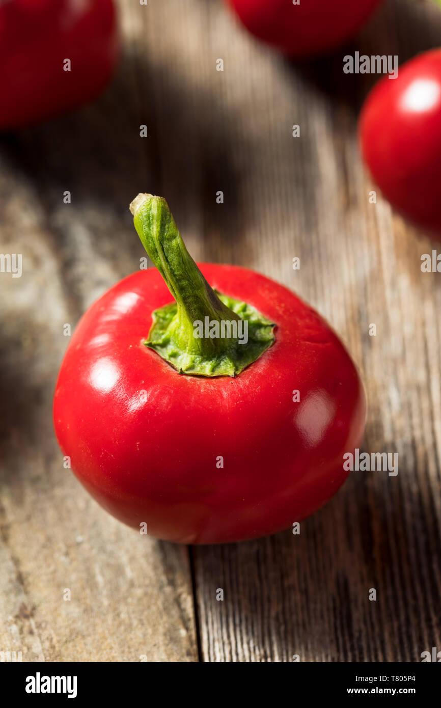 Raw Organic Red Cherry Bomb Peppers Ready to Cook Stock Photo - Alamy