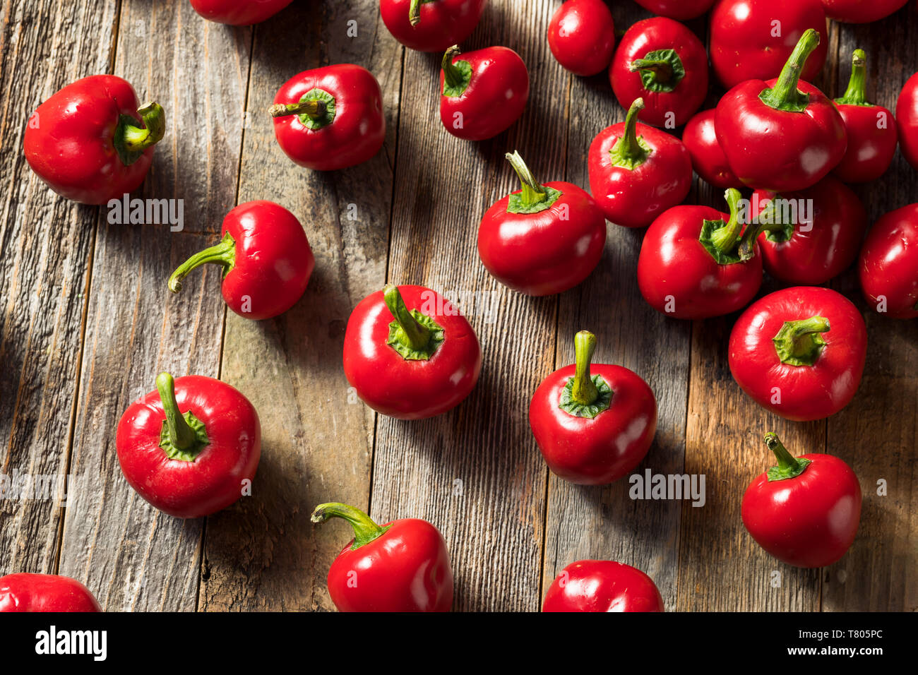 Raw Organic Red Cherry Bomb Peppers Ready to Cook Stock Photo - Alamy