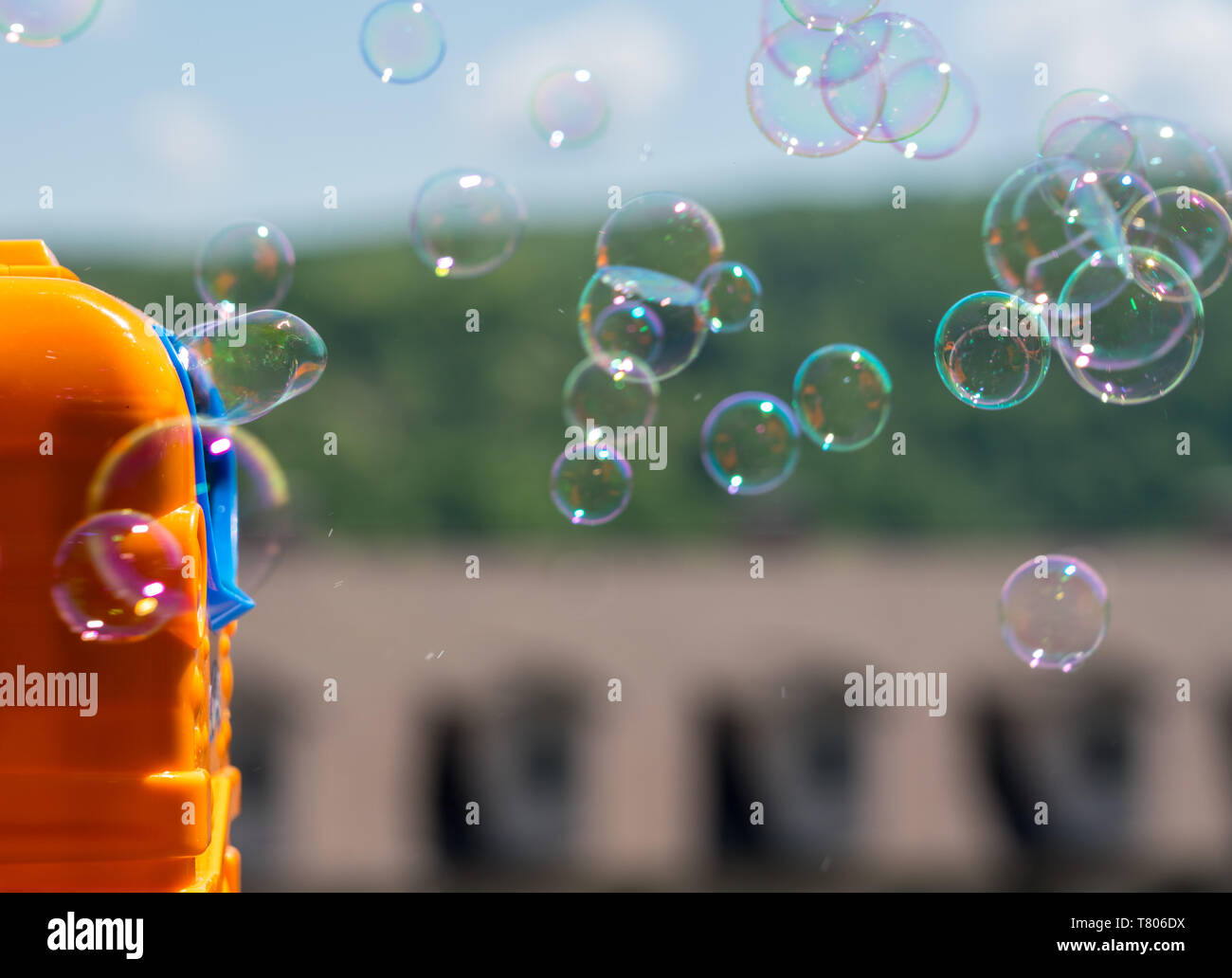 Childs mechanical soap bubble maker or blower Stock Photo - Alamy
