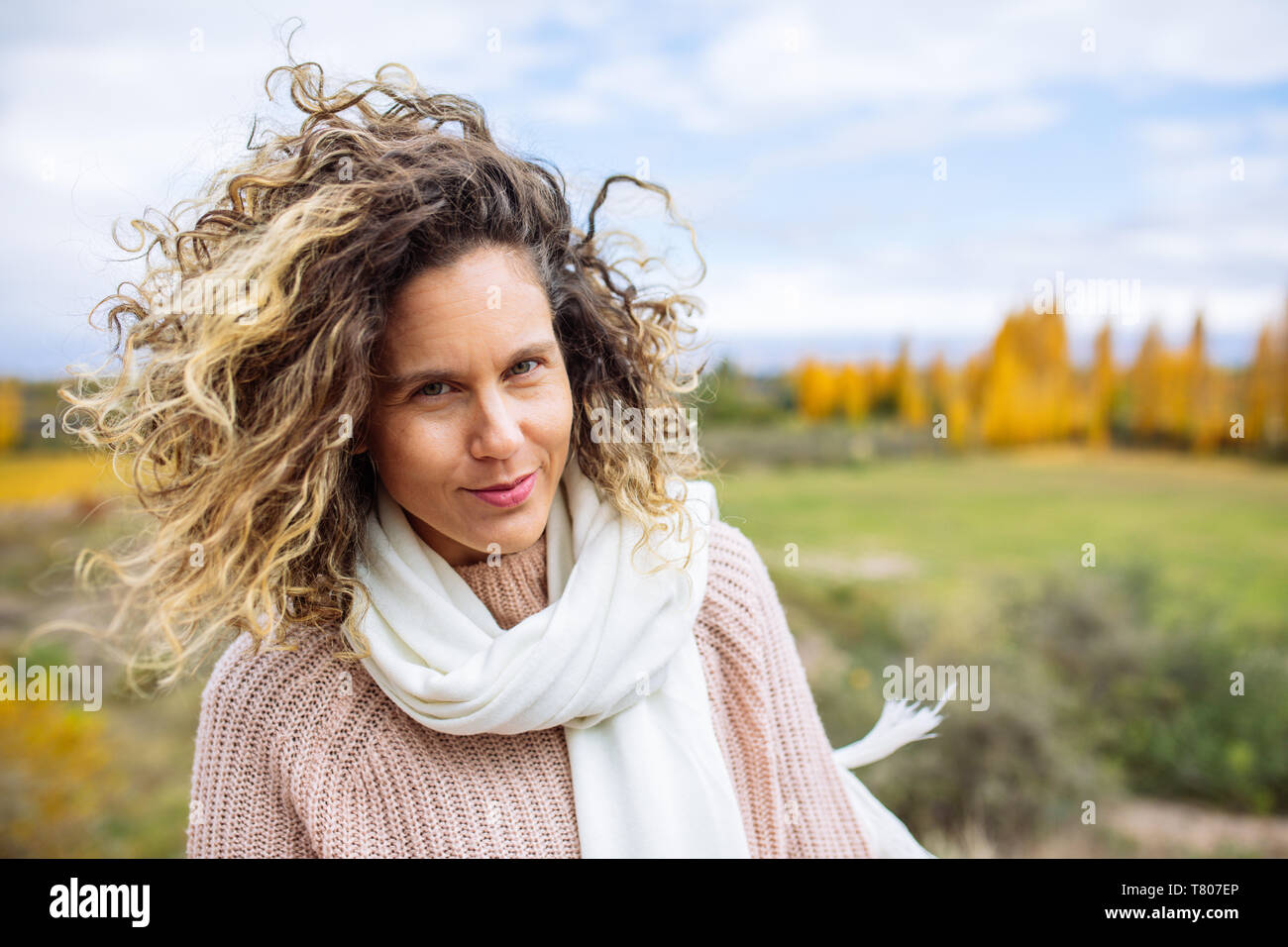 Model Woman in her thirties, smiling in a typical mendocino landscape ...